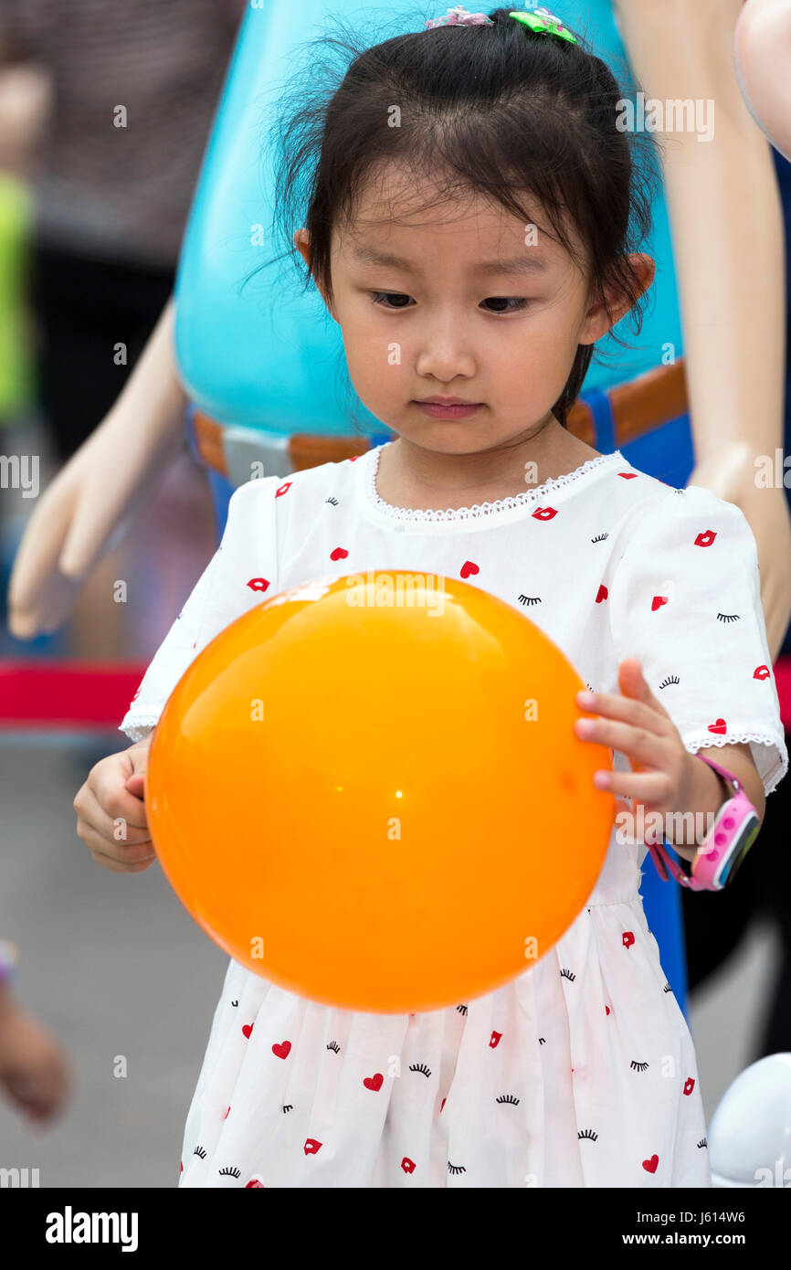 Chinese girl with balloon, Yinchuan, Ningxia, China Stock Photo - Alamy