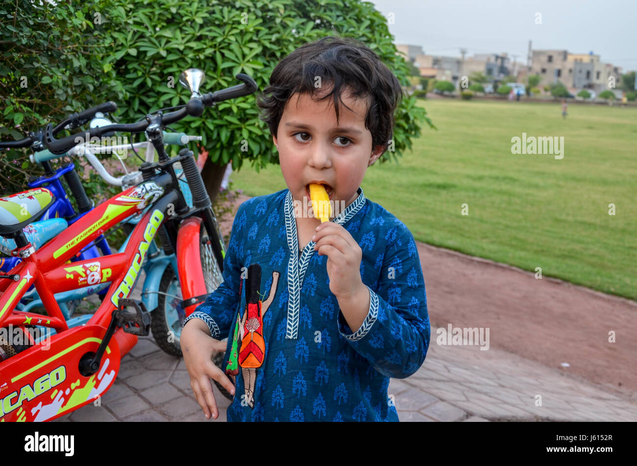 Pakistani Kids Enjoying Ice Cream in Lahore, Pakistan Stock Photo - Alamy