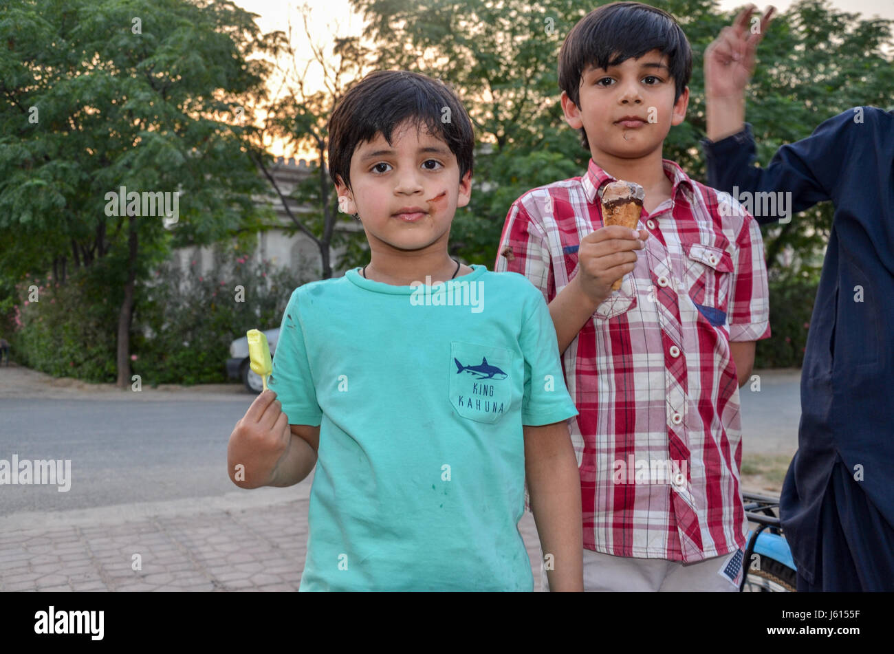 Pakistani Kids Enjoying Ice Cream in Lahore, Pakistan Stock Photo - Alamy