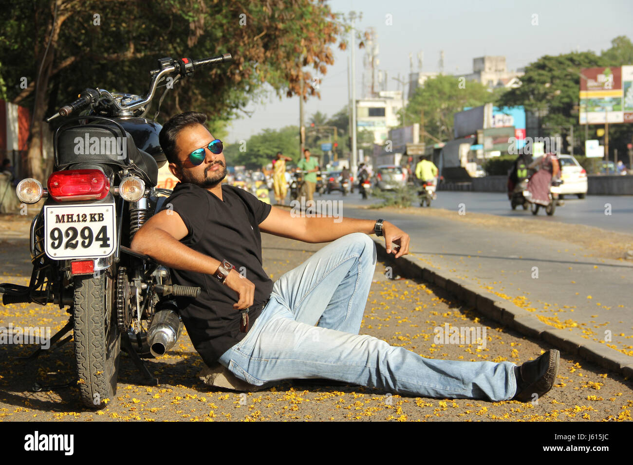 Indian man on bike hi-res stock photography and images - Alamy