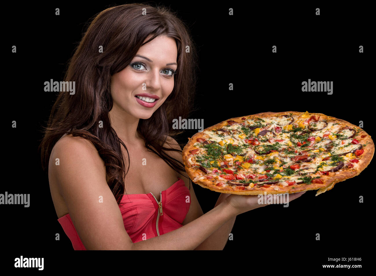 young woman with pizza against black background Stock Photo - Alamy