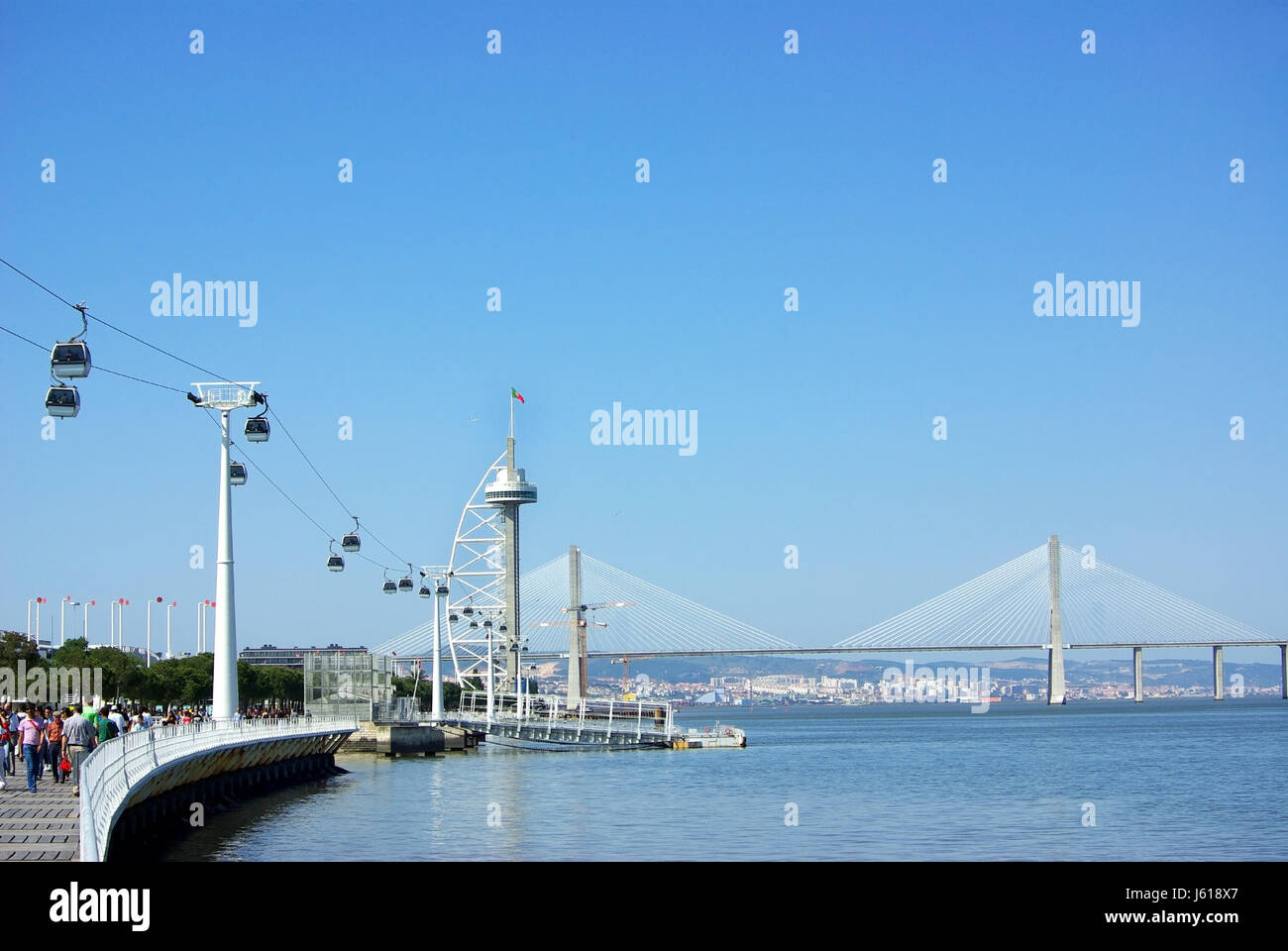 blue park ride flag high air tall lift humans human beings people folk ...