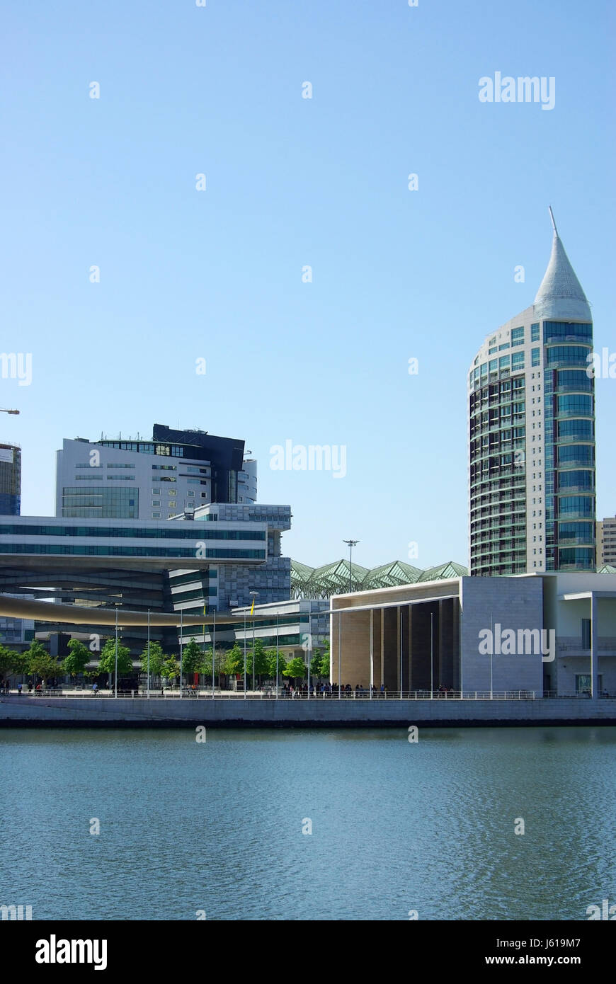 blue city town park high tall building humans human beings people folk ...