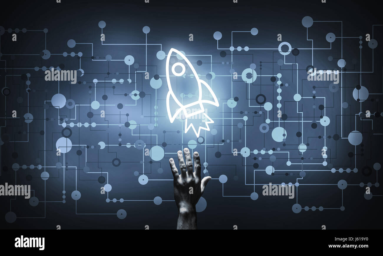 Technology idea concept with glowing rocket icon and touching it Stock ...