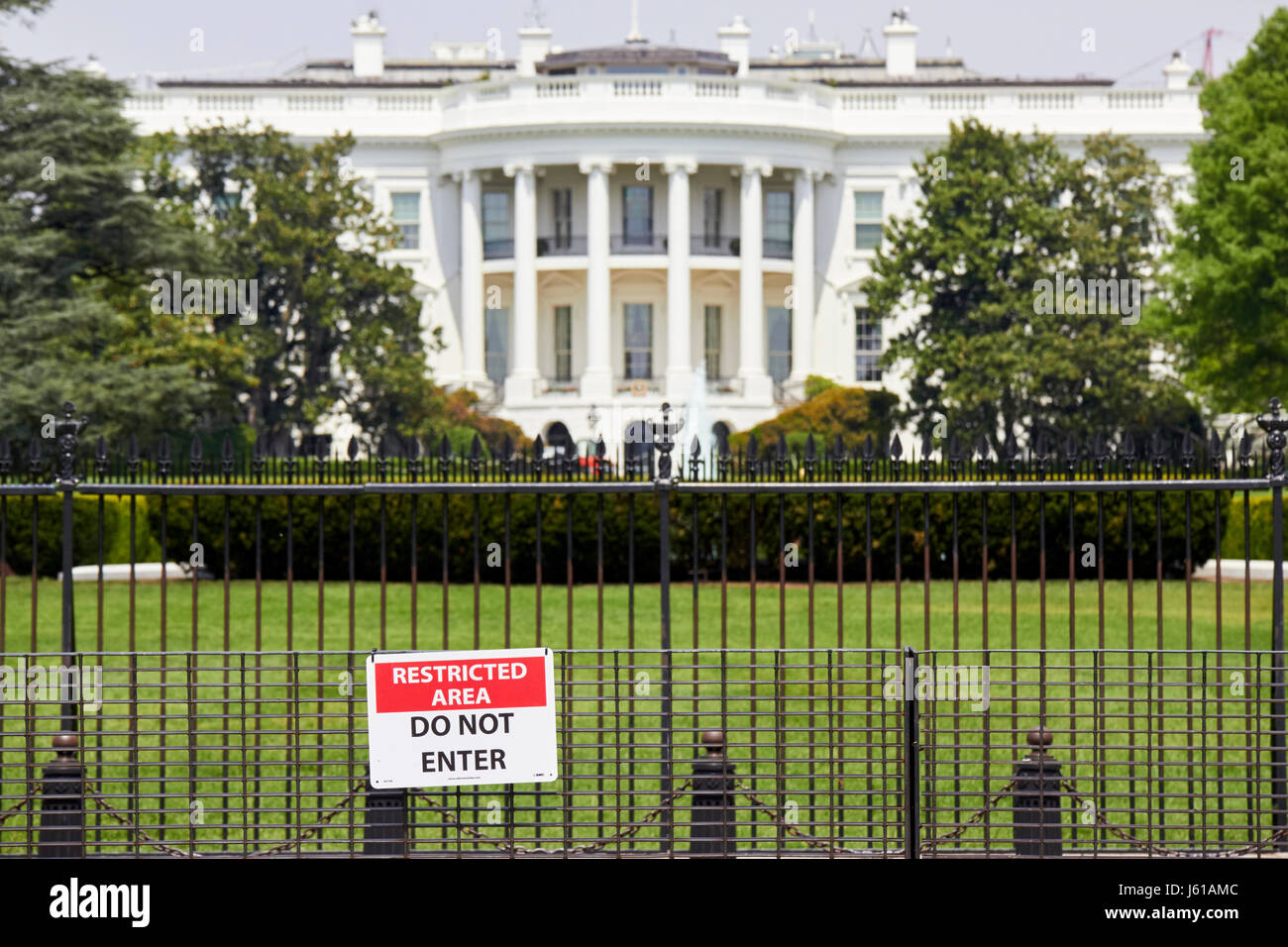 security fence and restricted area signs at the south facade of the ...
