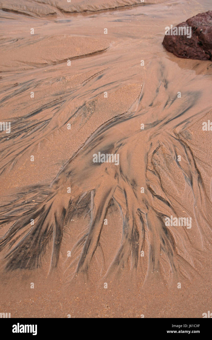 patterns in the sand beach Stock Photo - Alamy