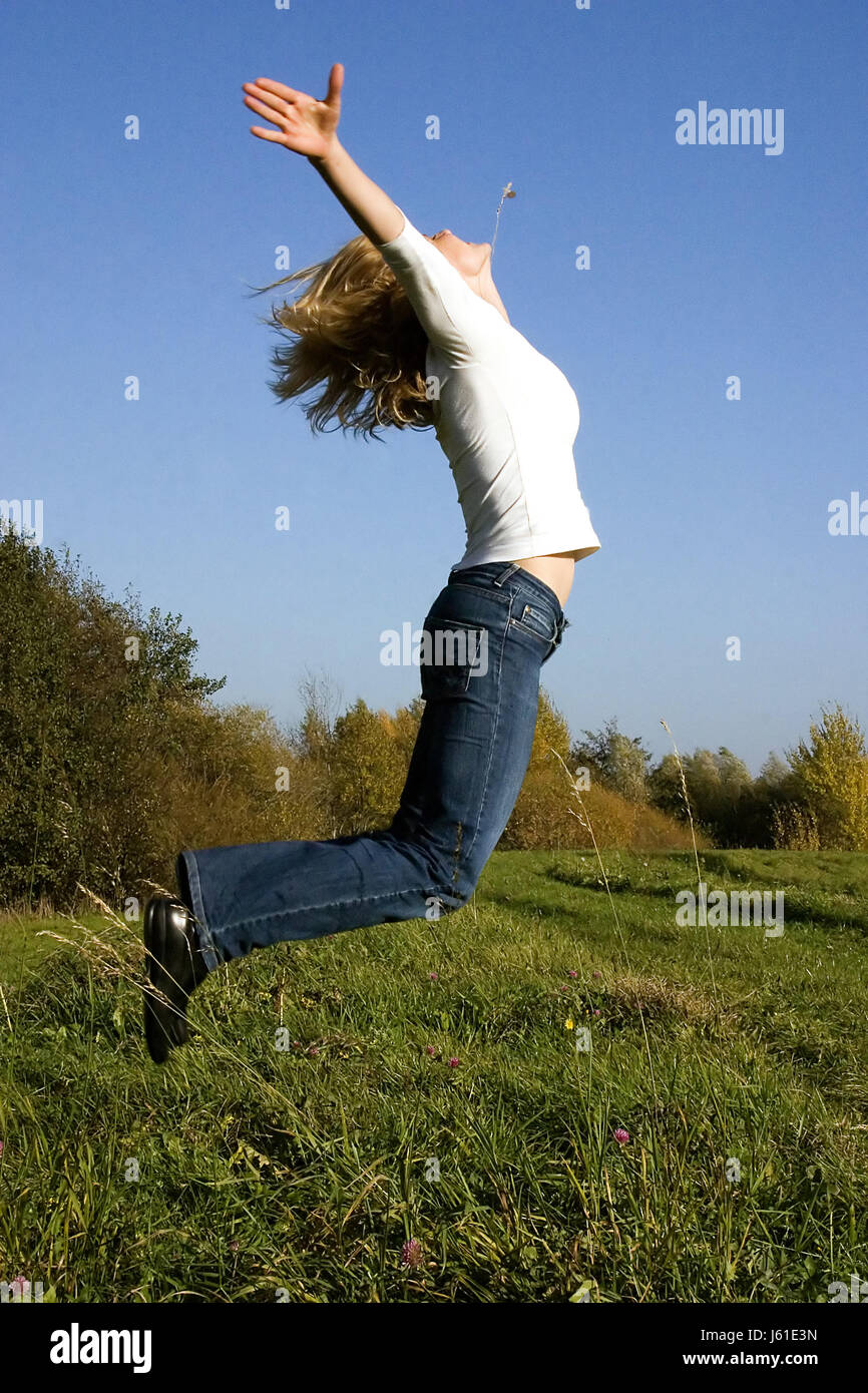 woman freedom liberty spring bouncing bounces hop skipping frisks ...