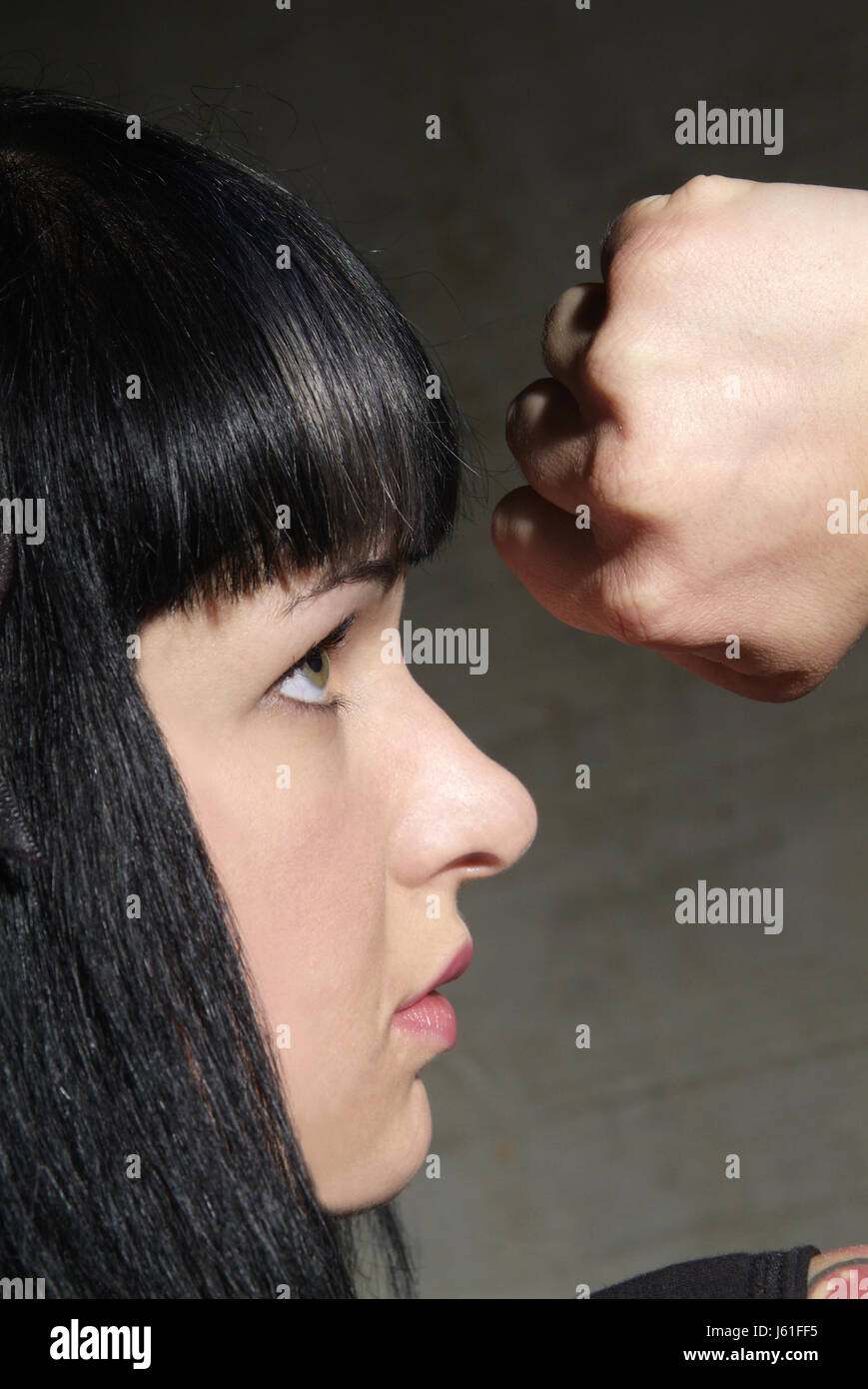 woman clenches fist Stock Photo - Alamy