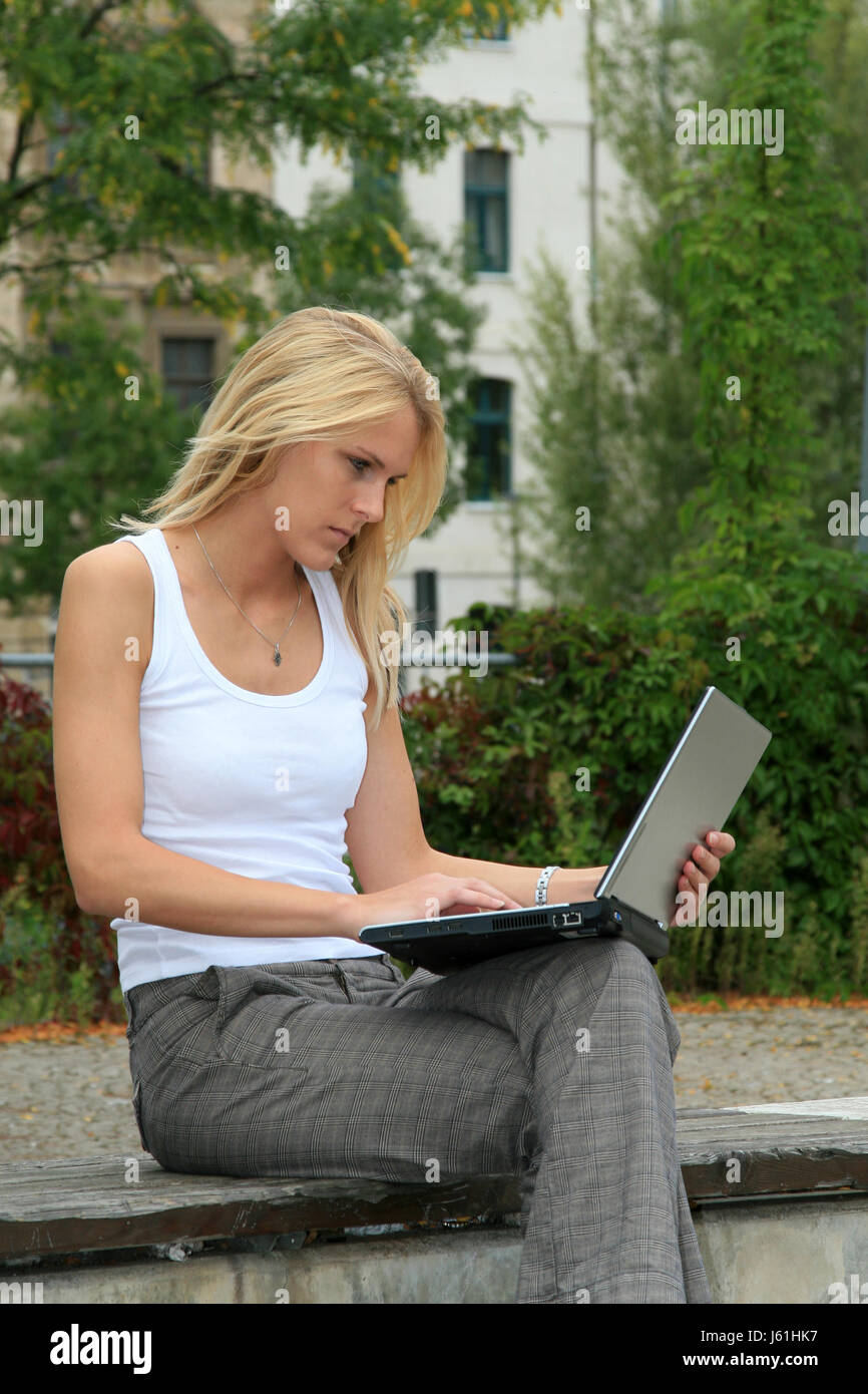 woman laptop notebook computers computer park put sitting sit seat ...