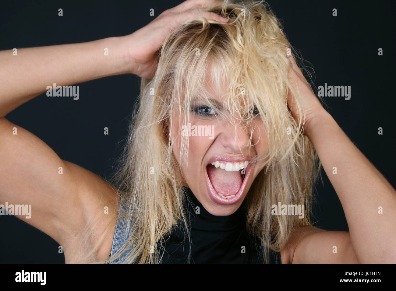 woman portrait raving furious angry irately blaze of anger emotion ...