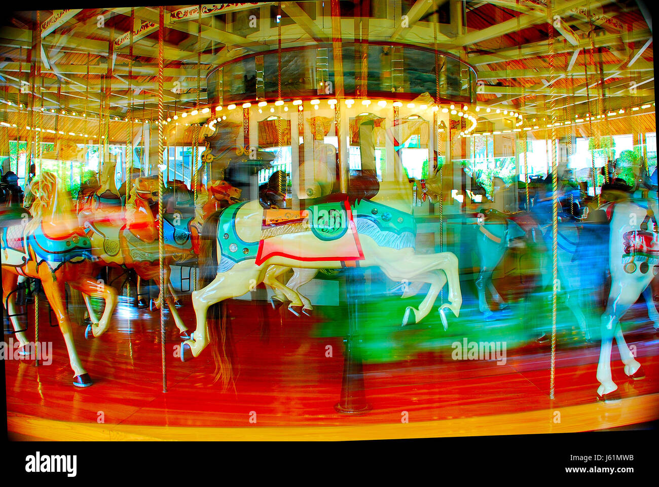 motion postponement moving movement horse horses carousel wooden ...