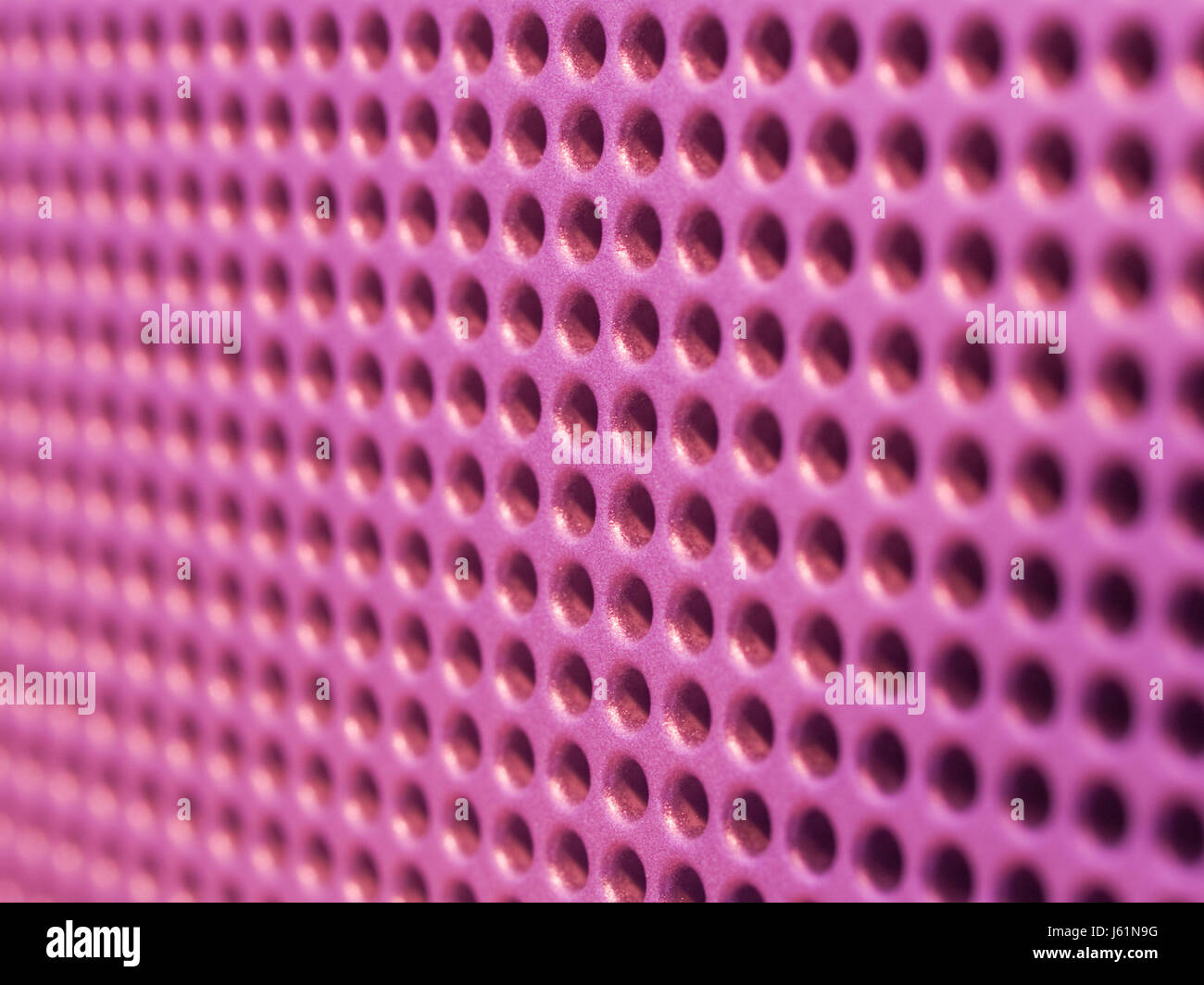 metal hole abstract pattern backdrop background pink macro close-up ...