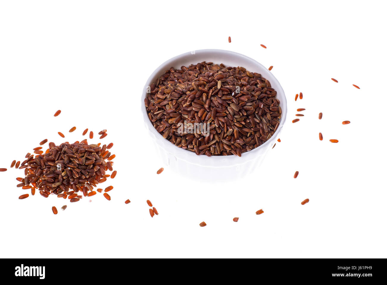 Red rice isolated on white background. Studio Photo Stock Photo - Alamy