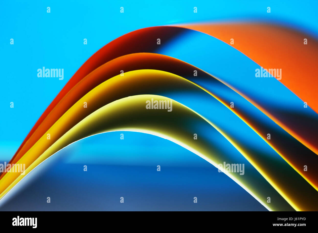 blue arc arcs orange sheet of paper paper yellow blue arc symbol ...