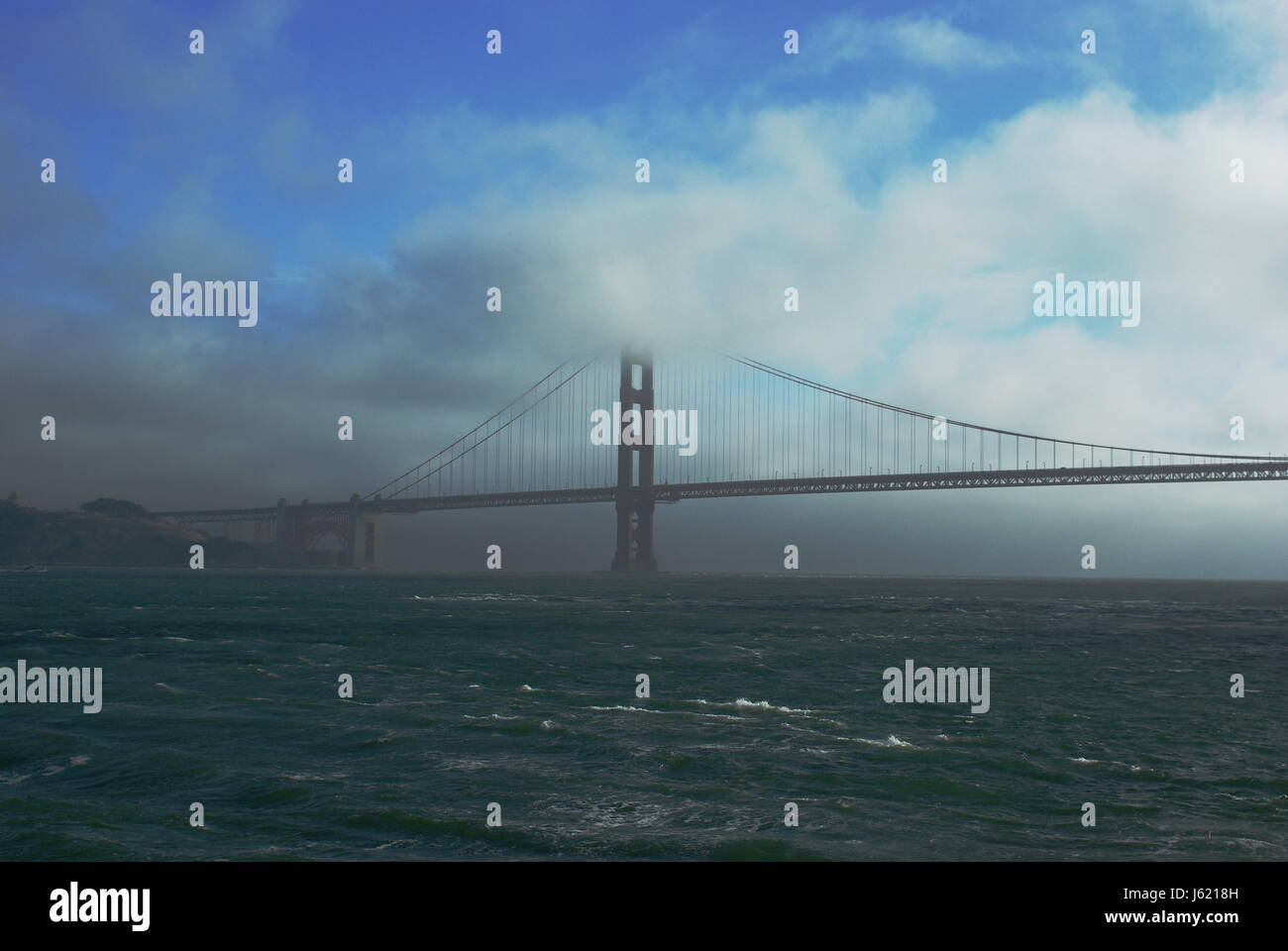 bridge goal passage gate archgway gantry golden cloudy bay clouds blue ...