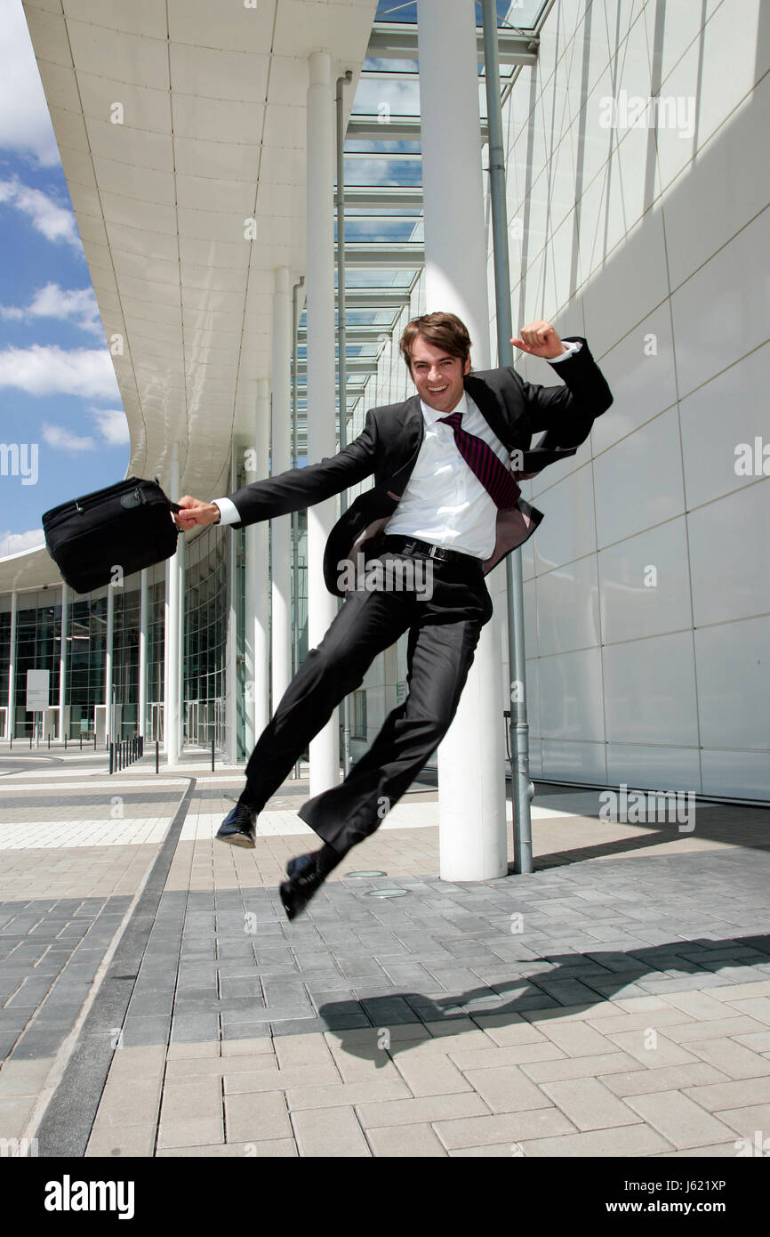 briefcase spring bouncing bounces hop skipping frisks jumping jump ...