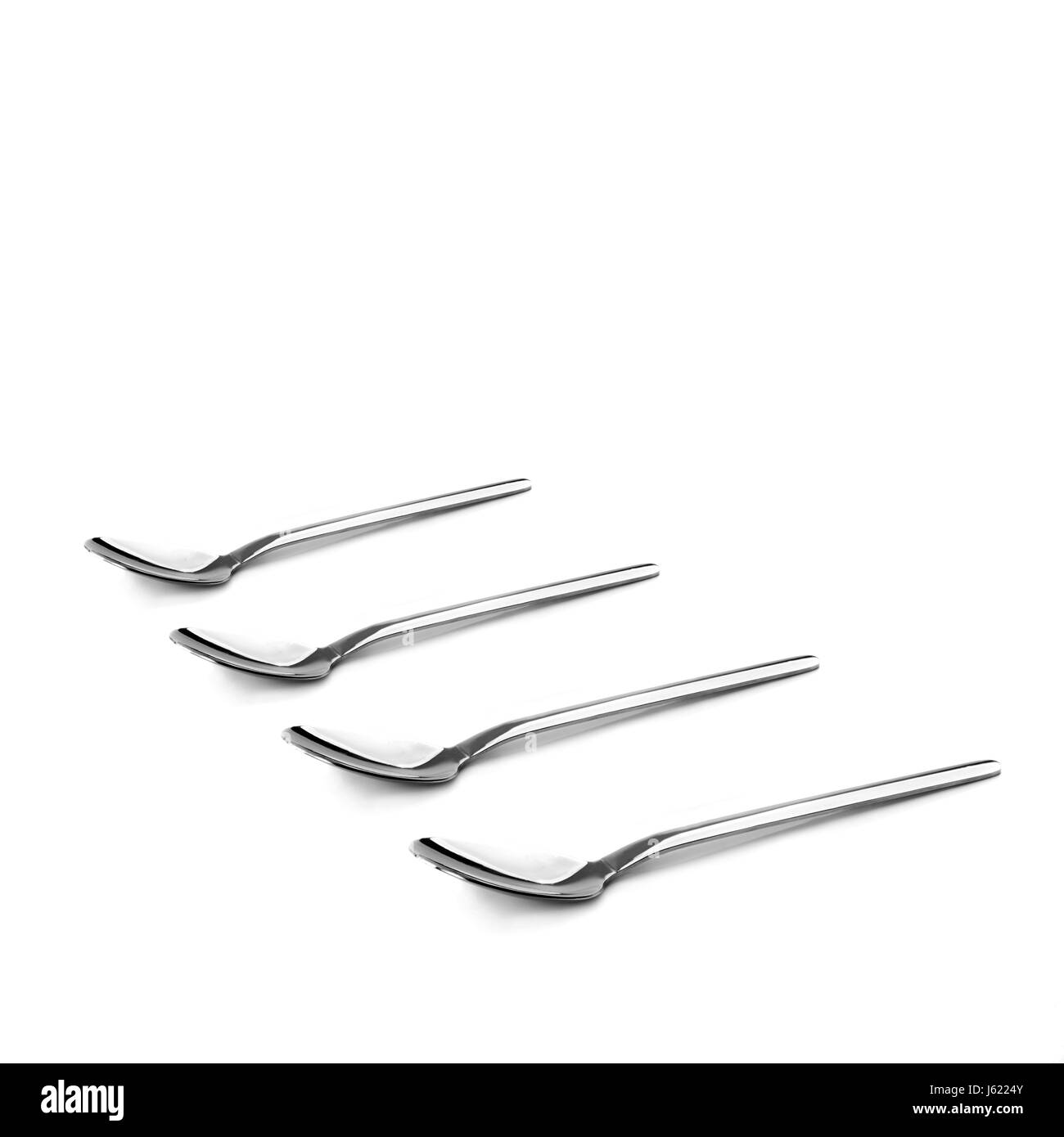 Four silver spoons hi-res stock photography and images - Alamy
