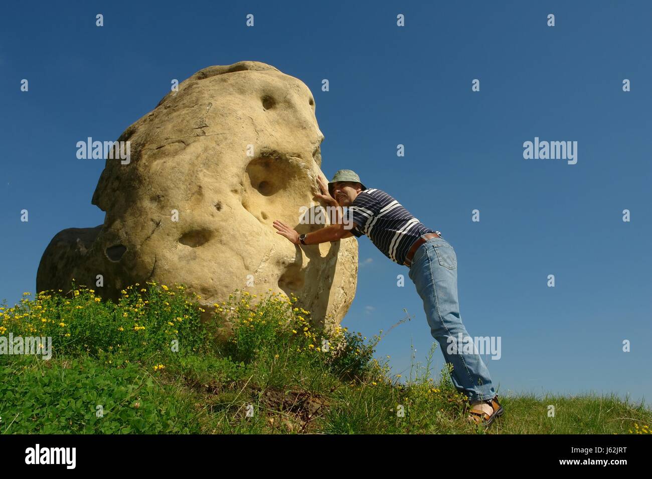 stone rock hunks chunk memorial stone pushing shove print man tree ...