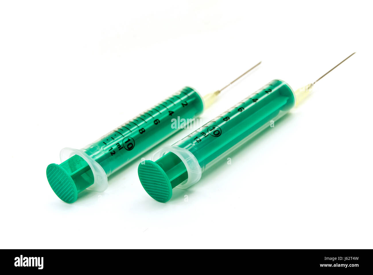 Two syringes Cut Out Stock Images & Pictures - Alamy