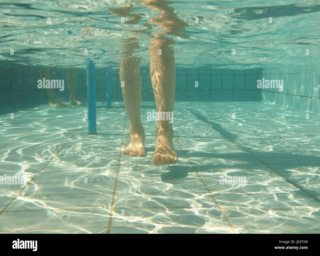 Children underwater feet hi-res stock photography and images - Alamy