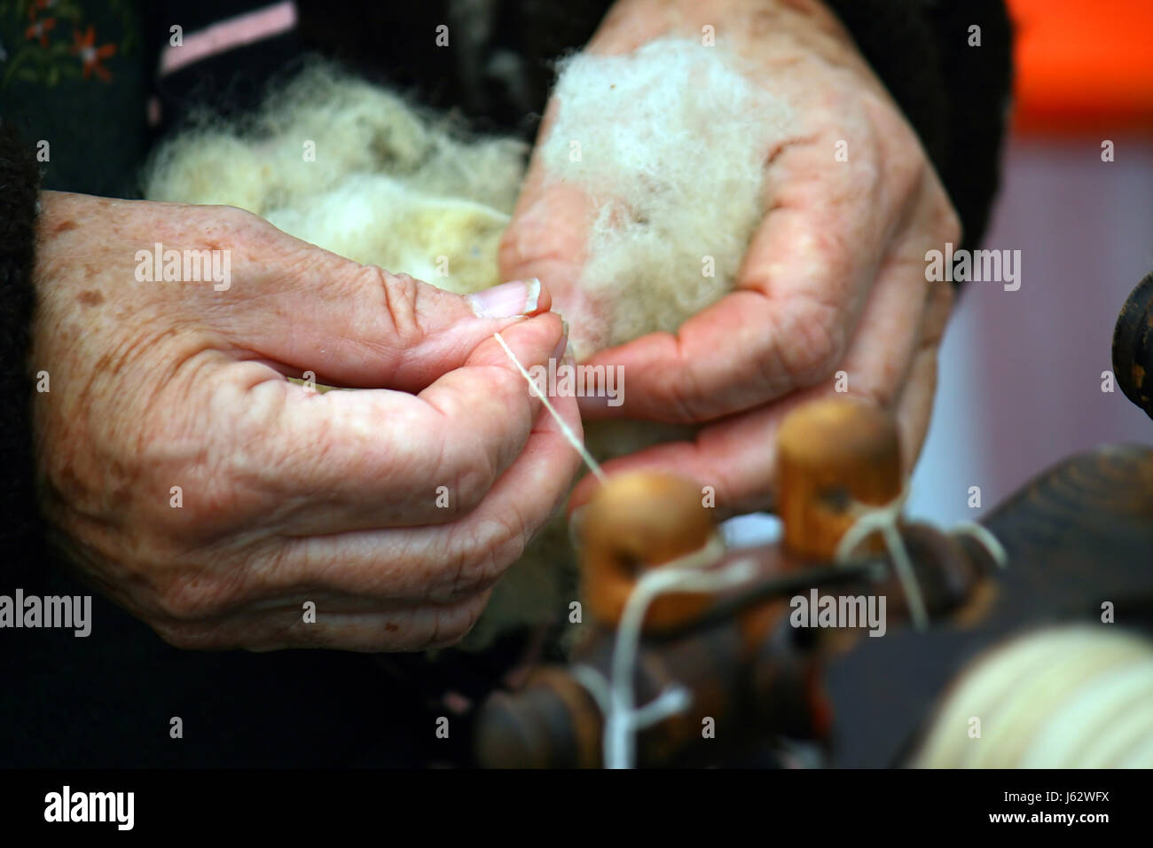 wool spin spinning-wheel spindle yarn woman hand hands story person ...