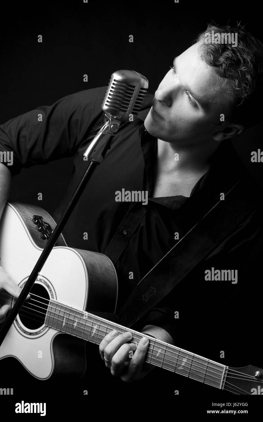music musician guitar microphone singing young younger man humans human ...