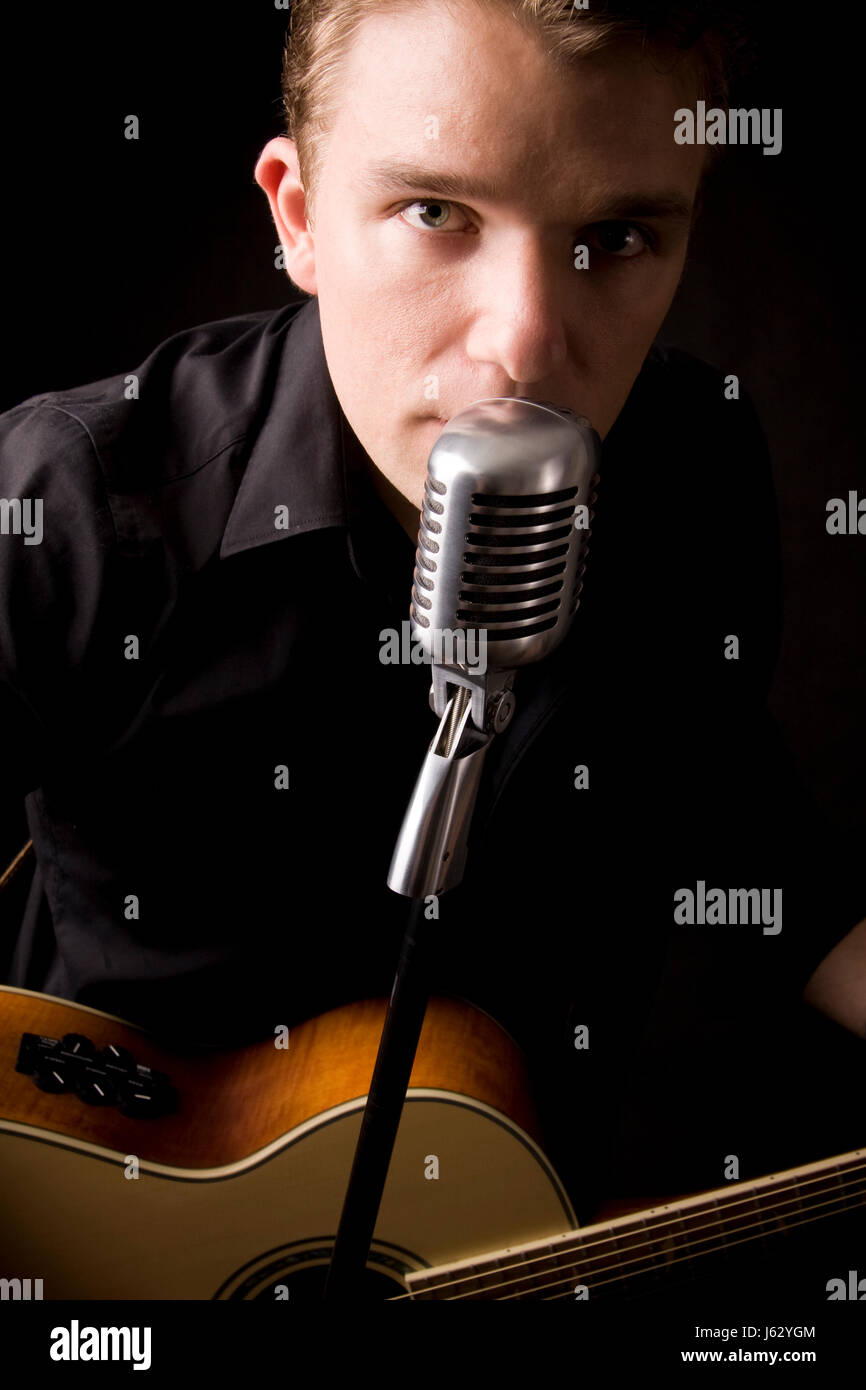 music musician guitar microphone singing young younger man humans human ...