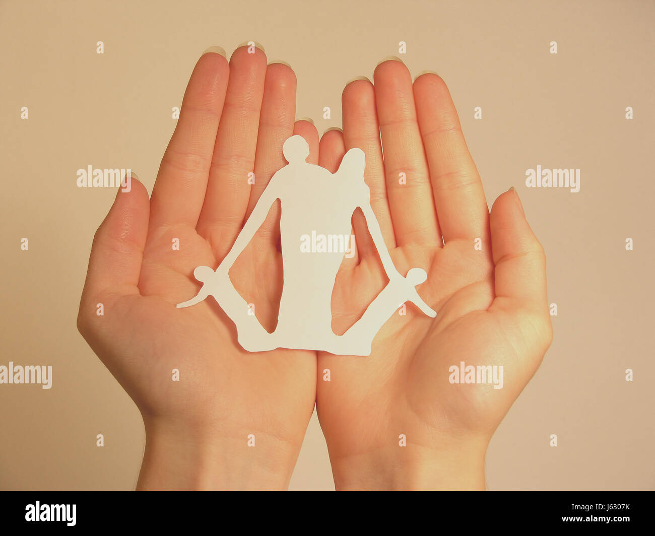 hands with family Stock Photo - Alamy