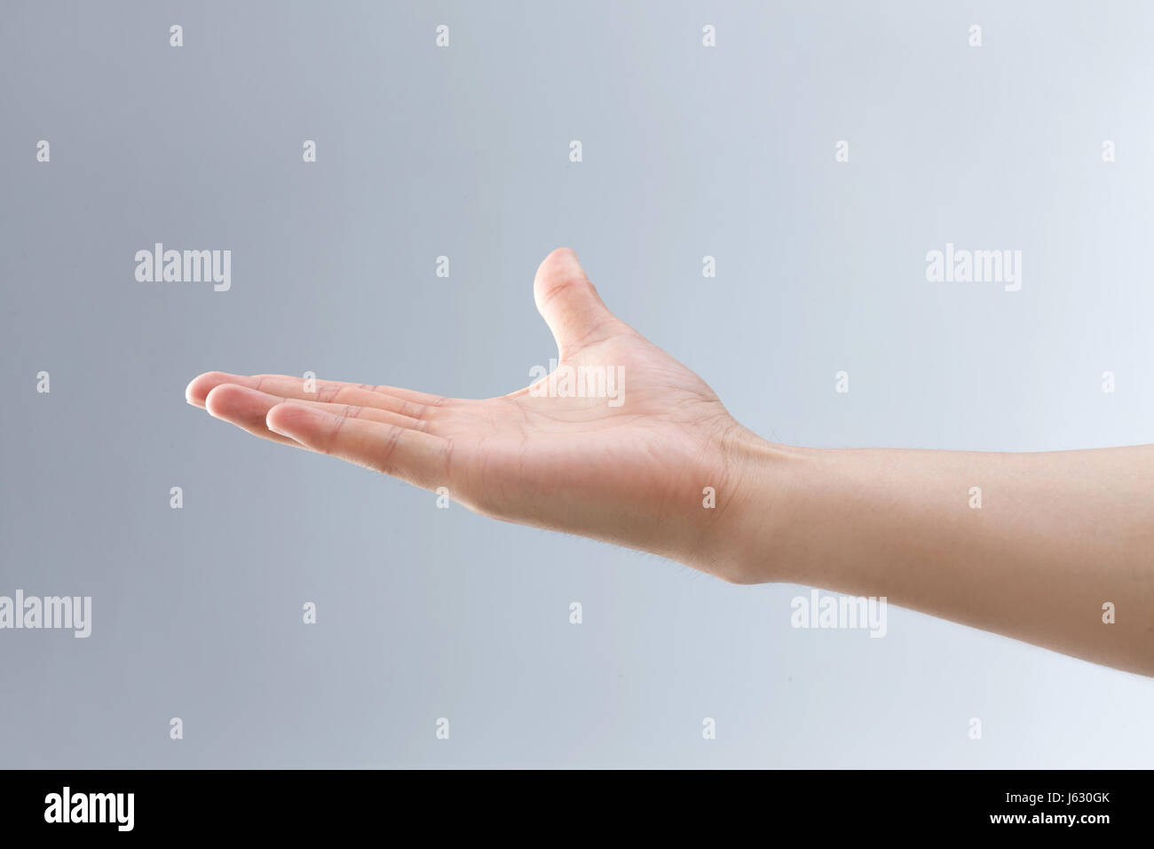 Hand reaching out palm up hi-res stock photography and images - Alamy