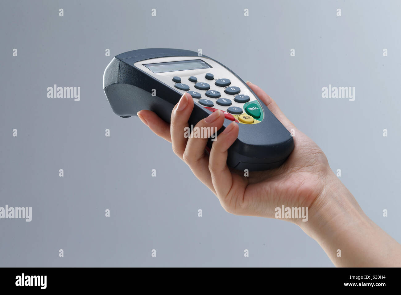 Hand holding POS Stock Photo - Alamy