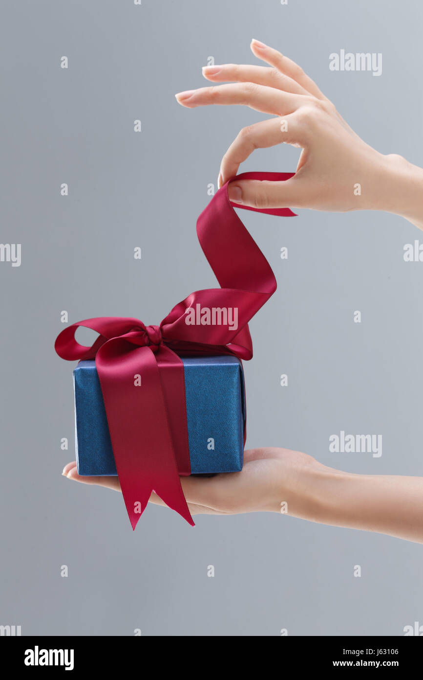Hand delivering gift hi-res stock photography and images - Alamy