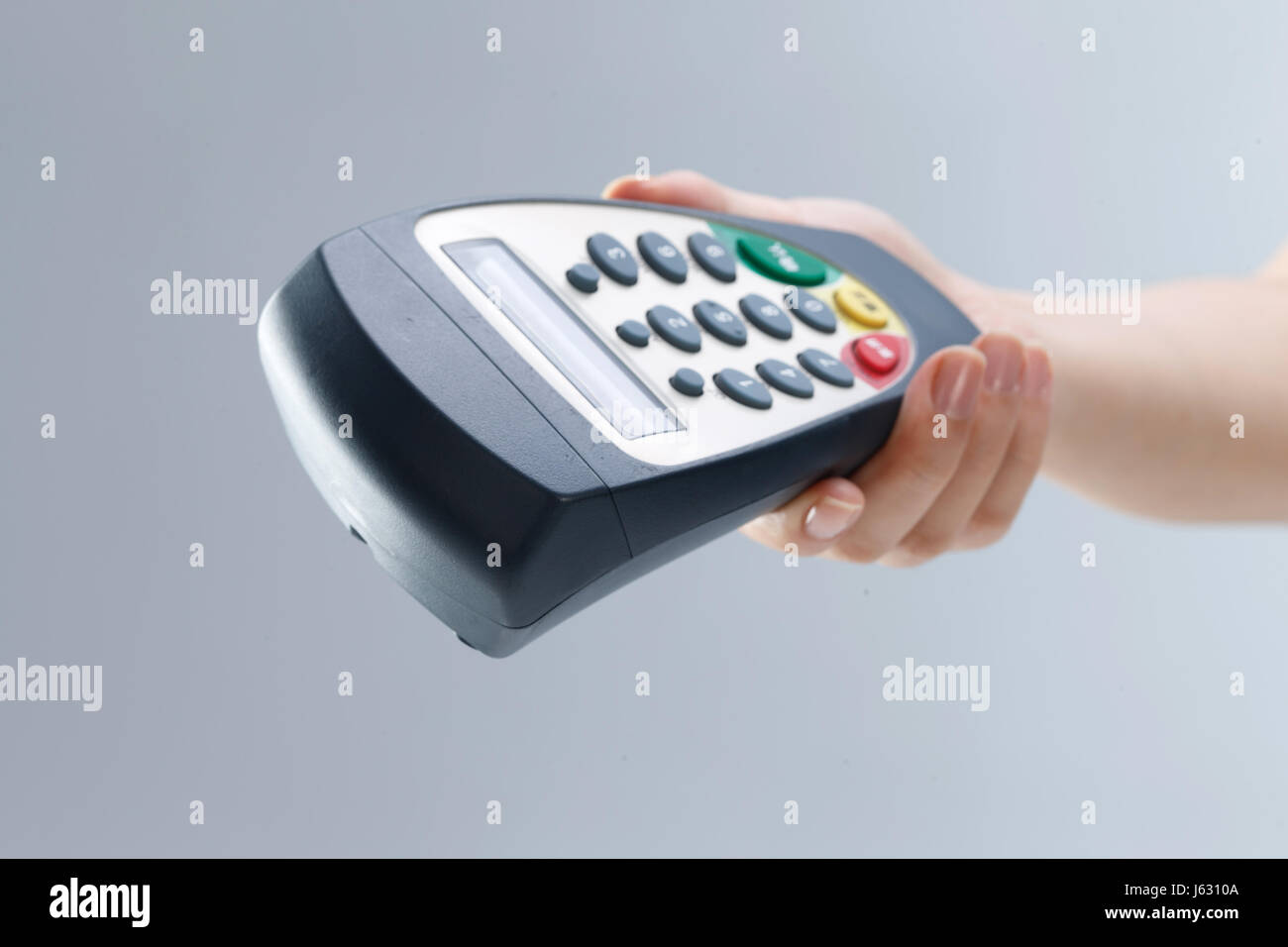 Hand holding POS Stock Photo - Alamy