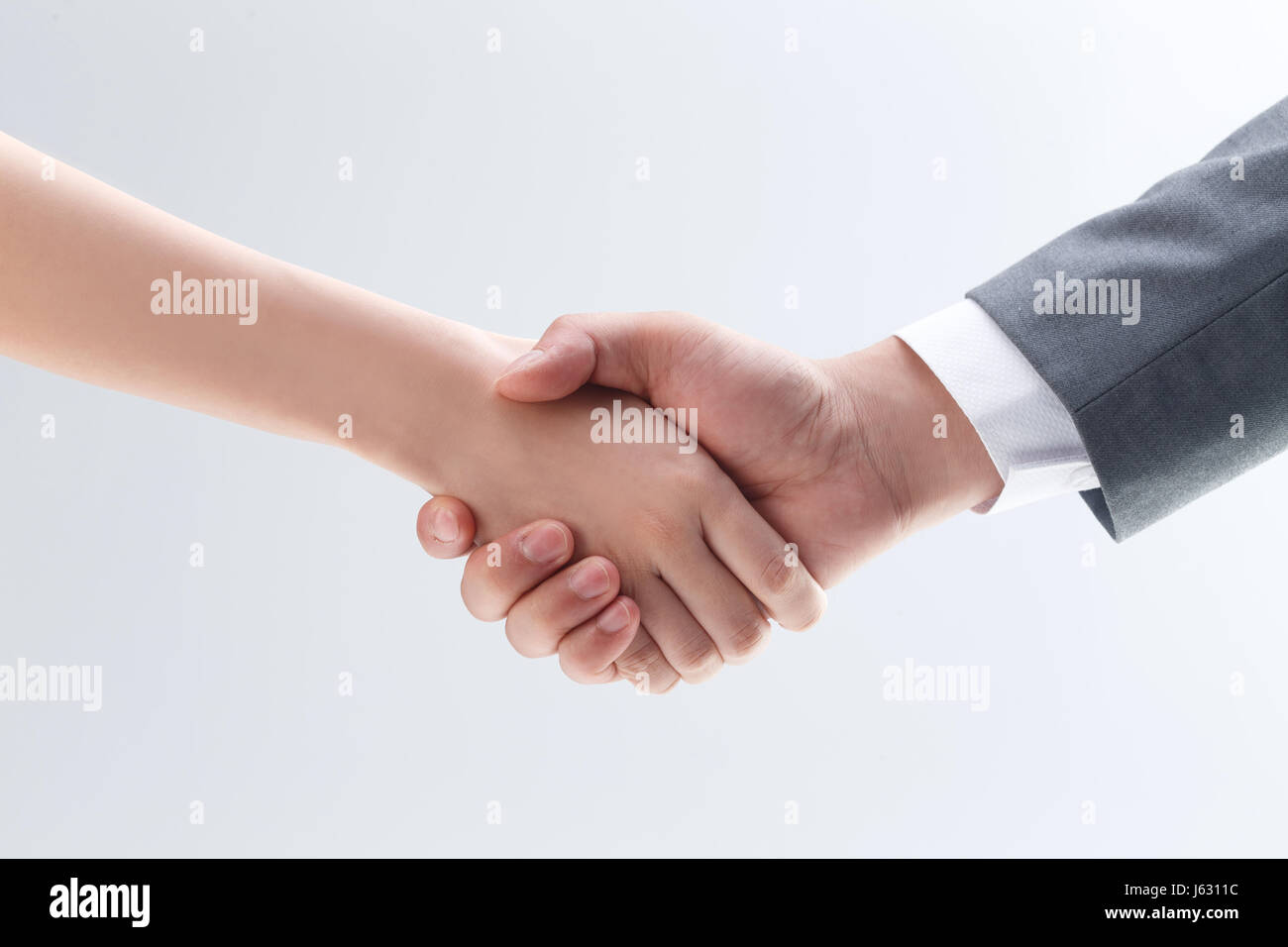 Women handshake cut out hi-res stock photography and images - Alamy