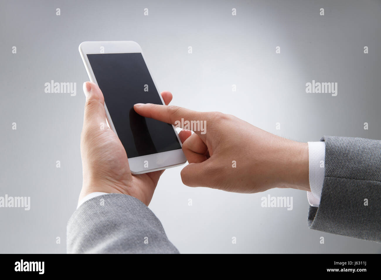 Hand holding mobile phone Stock Photo - Alamy