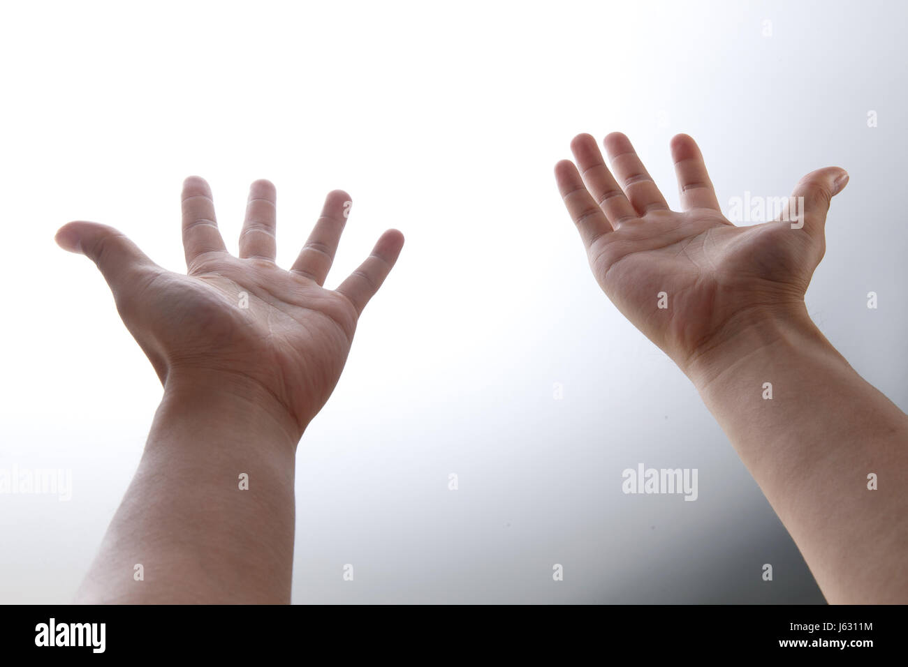 Hand reaching out palm up hi-res stock photography and images - Alamy