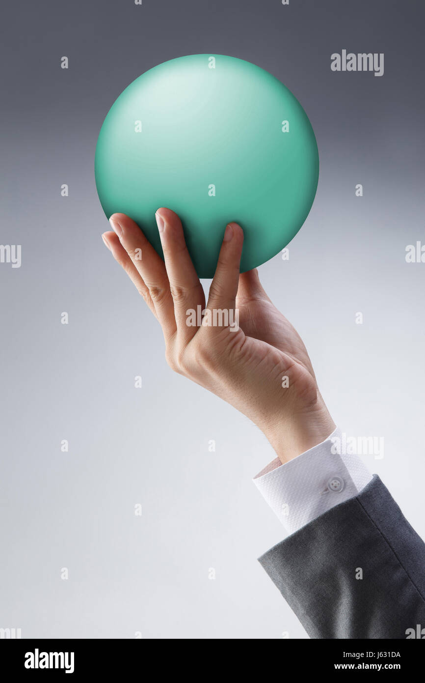 Adult hand holding out ball hi-res stock photography and images - Alamy