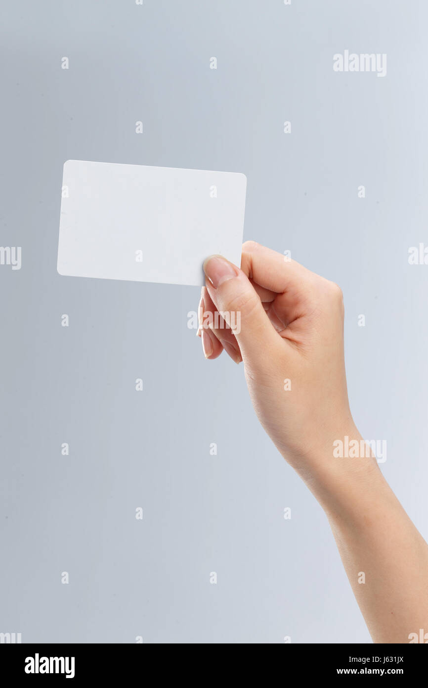 The hand holding the card Stock Photo - Alamy