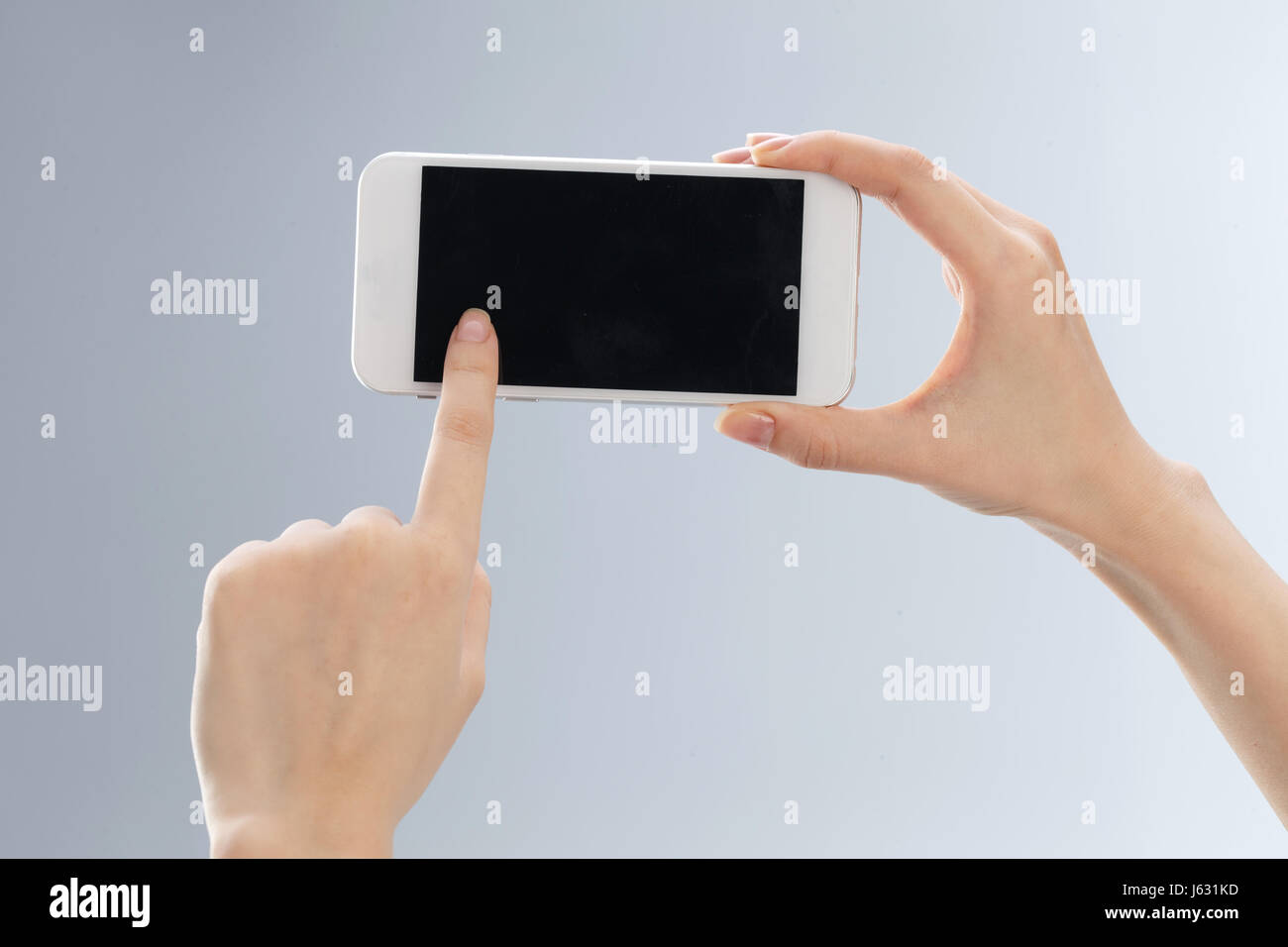Hand holding mobile phone Stock Photo - Alamy