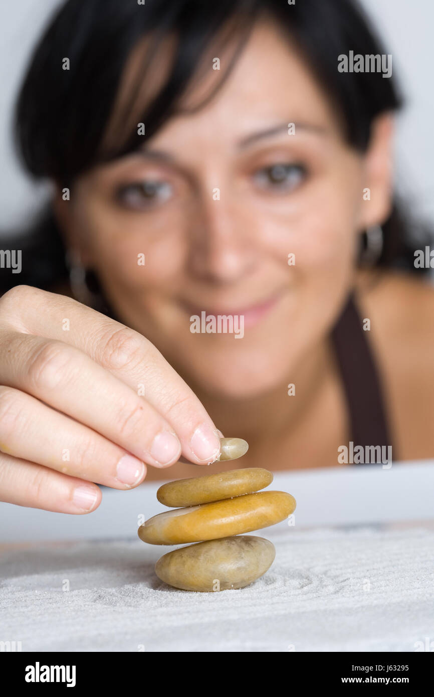 woman balance young younger building stones woman humans human beings ...