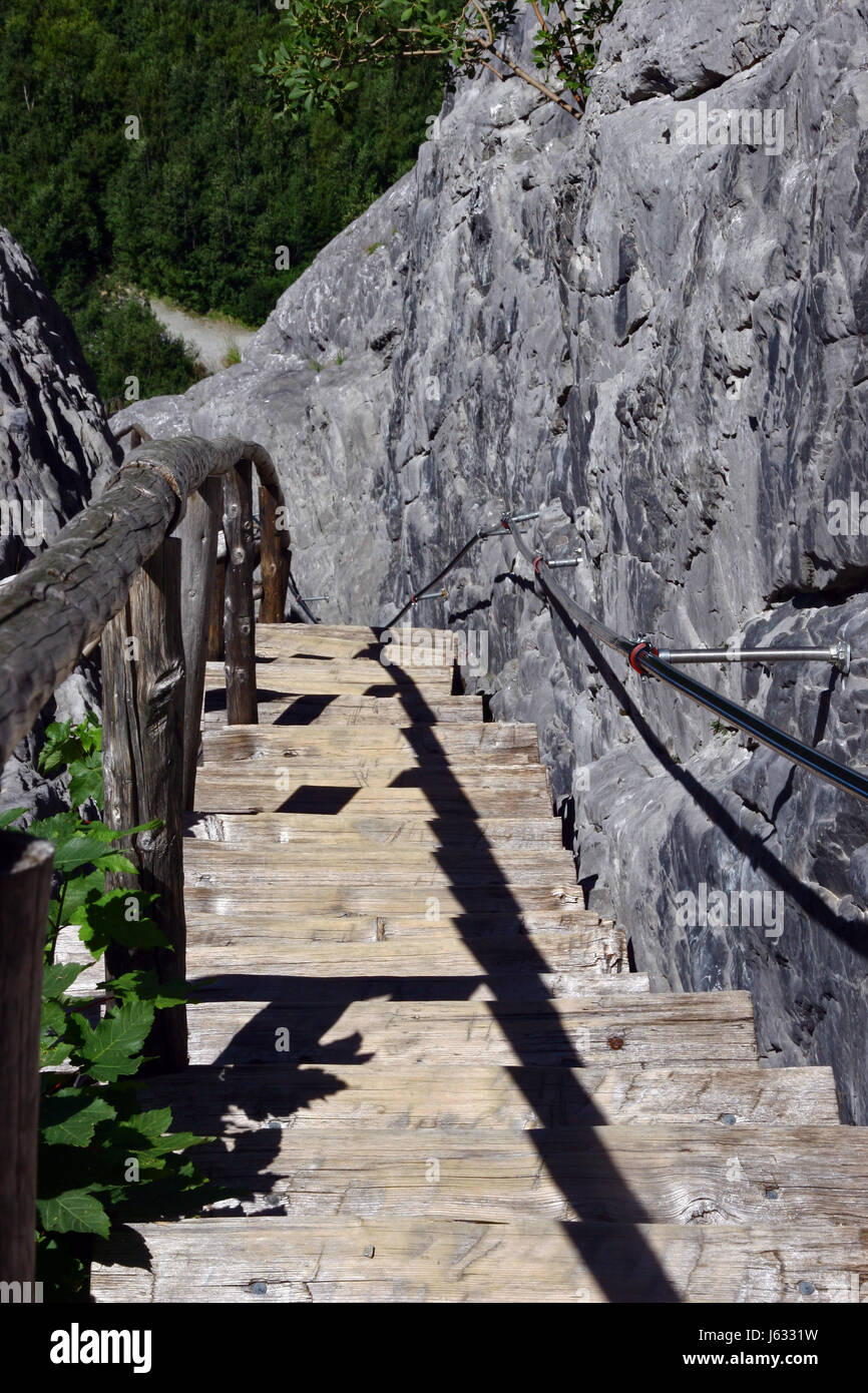 alps switzerland rock railing downwards down stairs alps switzerland ...