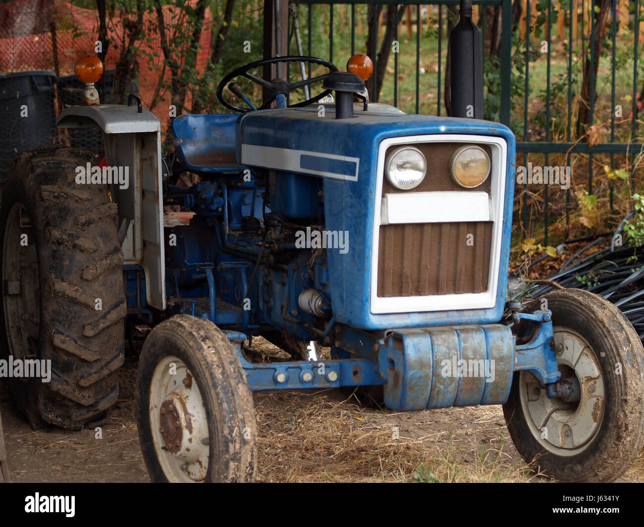 blue agriculture farming small tiny little short tractor shed white ...