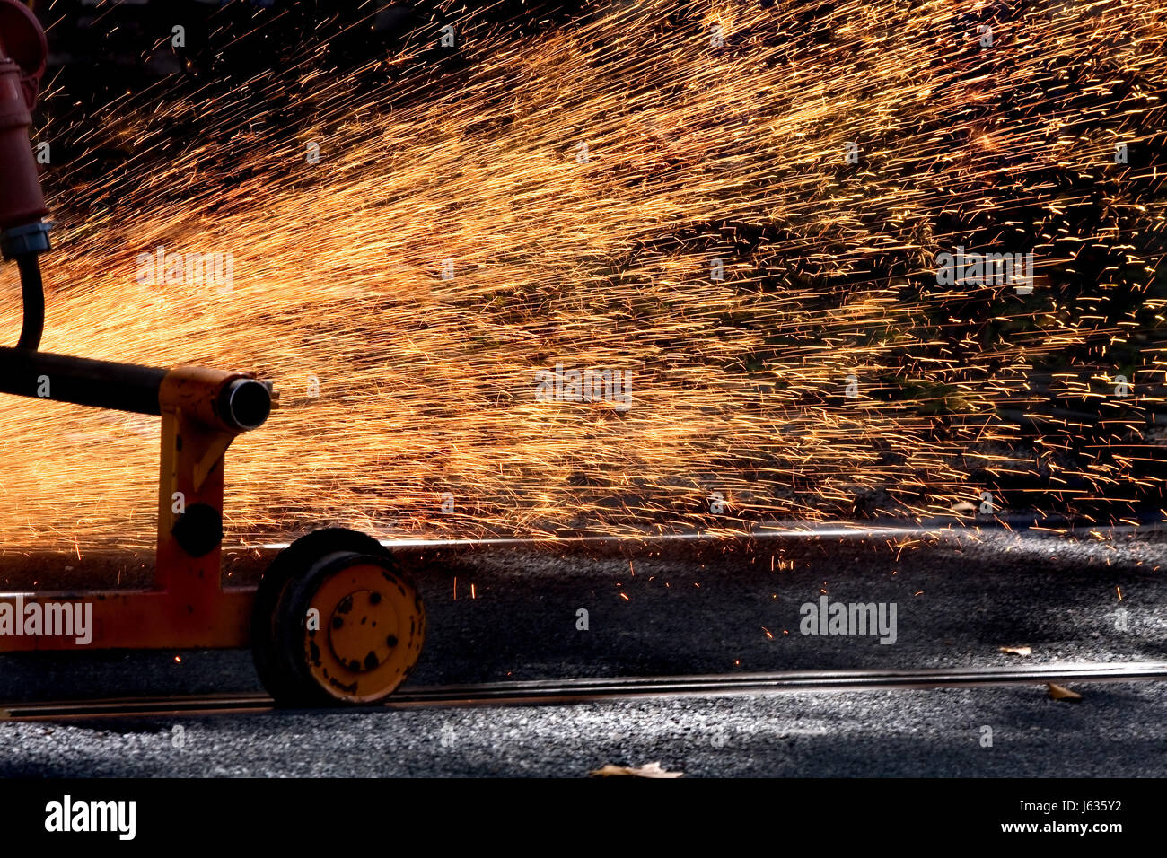 hot grind grinding machine spray work job labor sparks orange engine ...