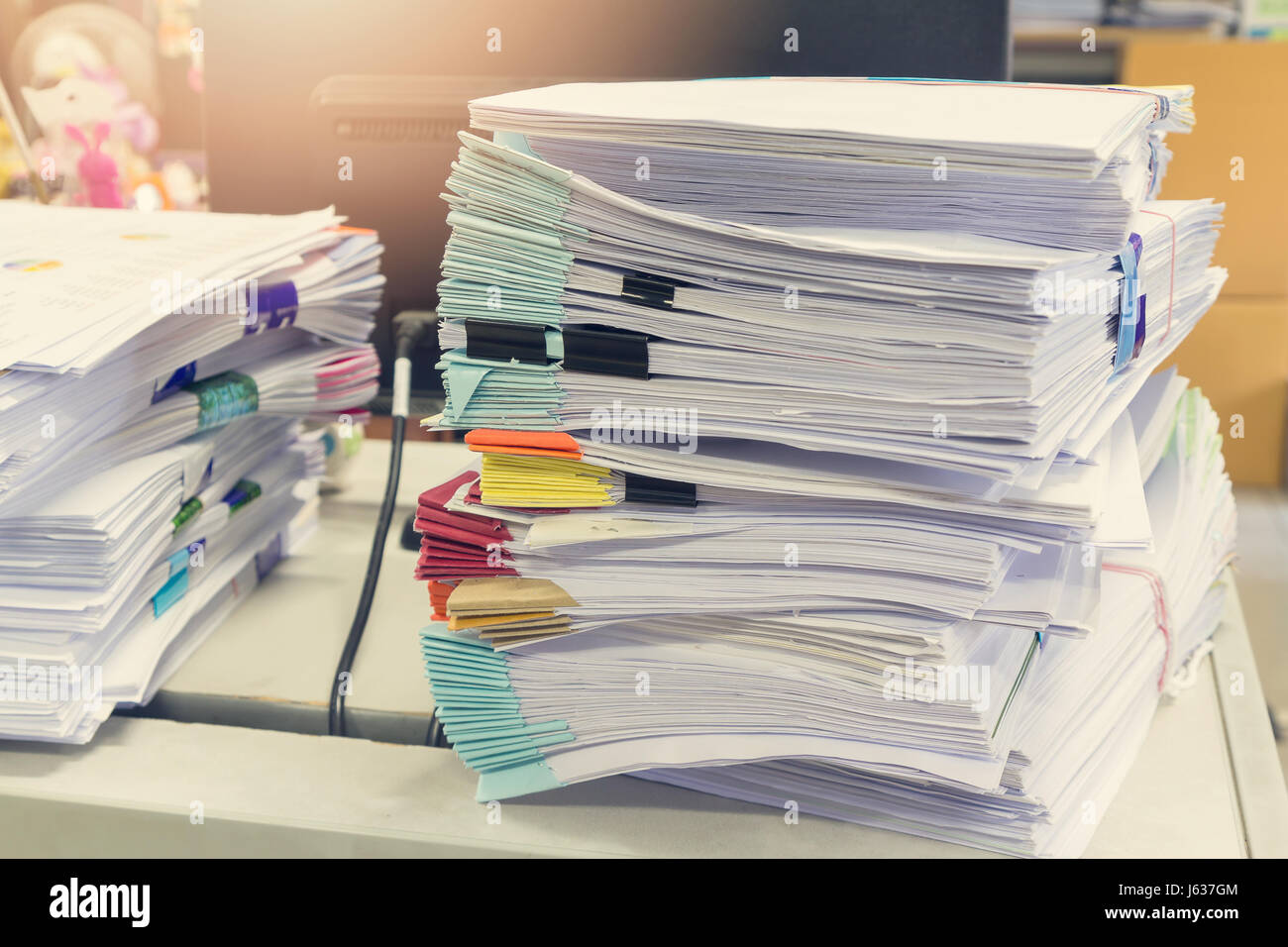 Pile of unfinished documents on office desk, Stack of business paper ...