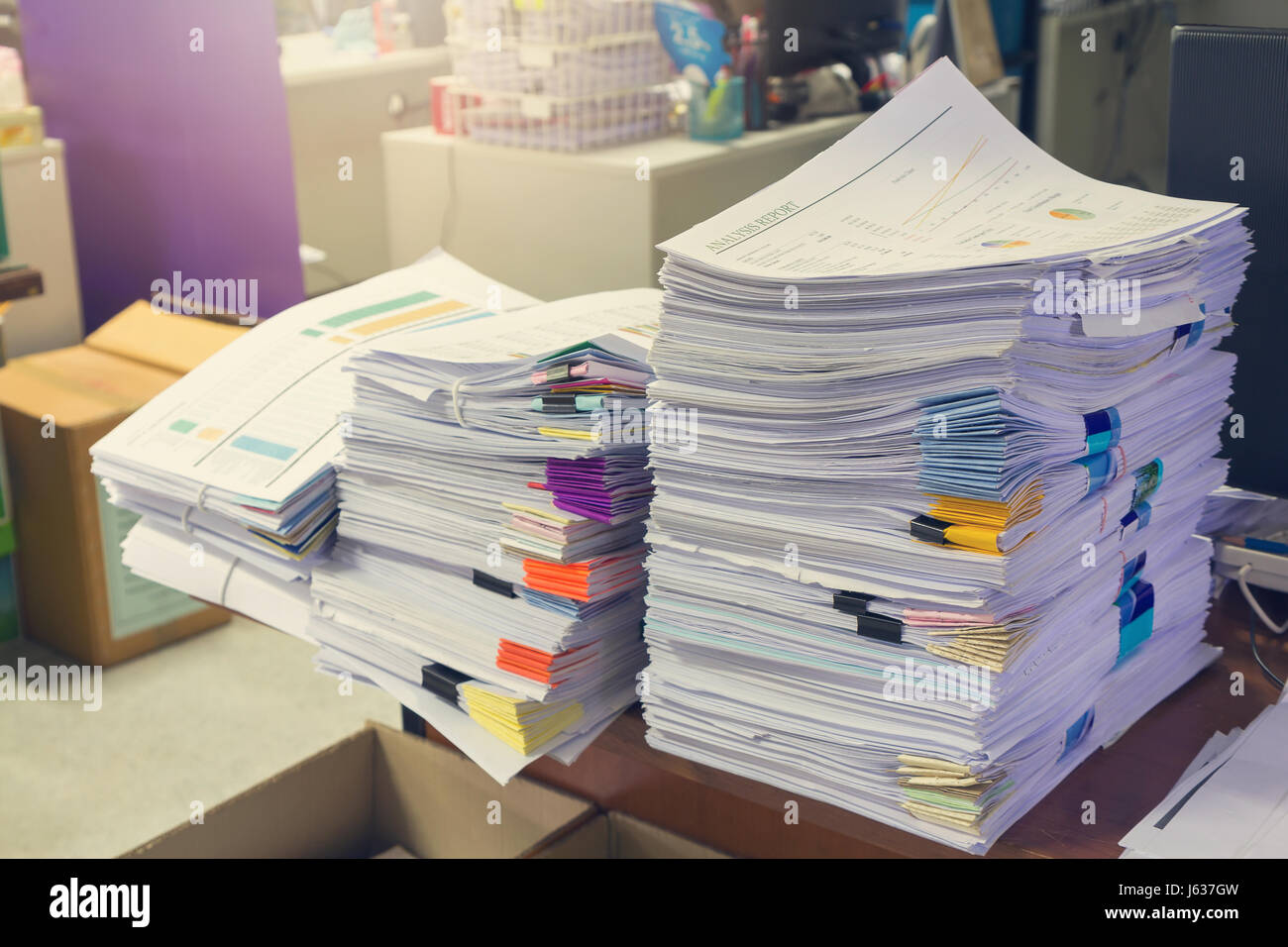 Pile of unfinished documents on office desk, Stack of business paper ...