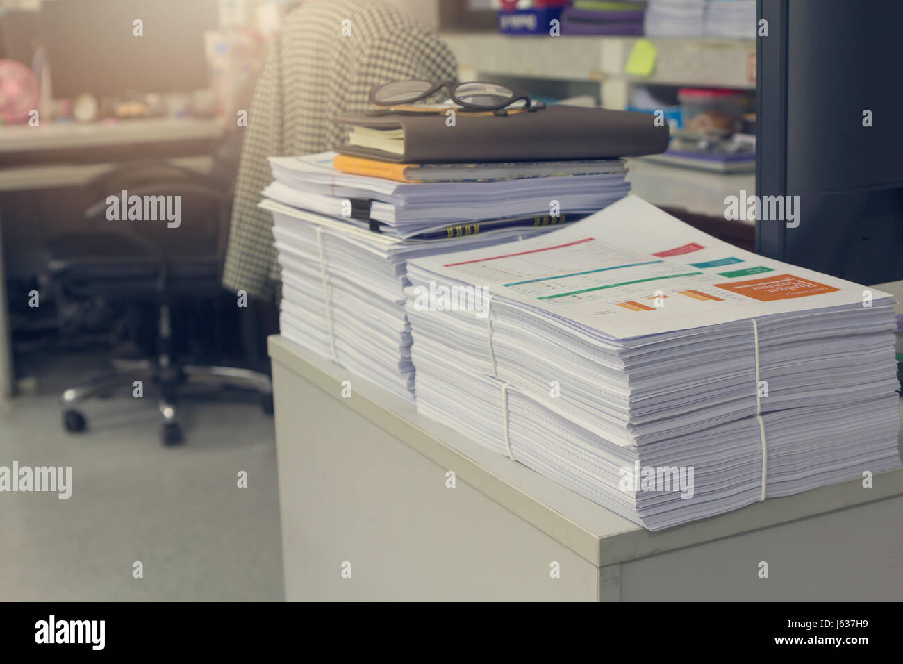 Pile of unfinished documents on office desk, Stack of business paper ...