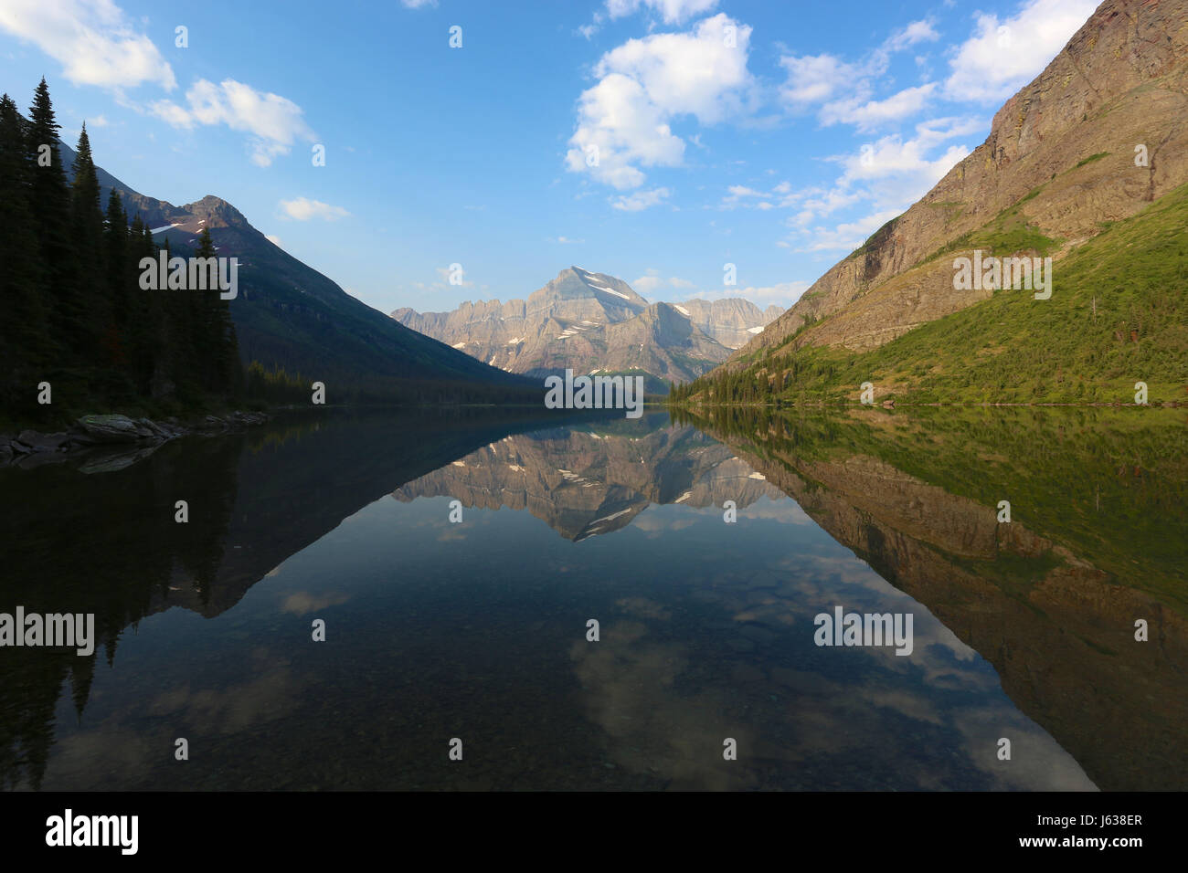 Glacier National Park Alpine lake reflection Stock Photo - Alamy