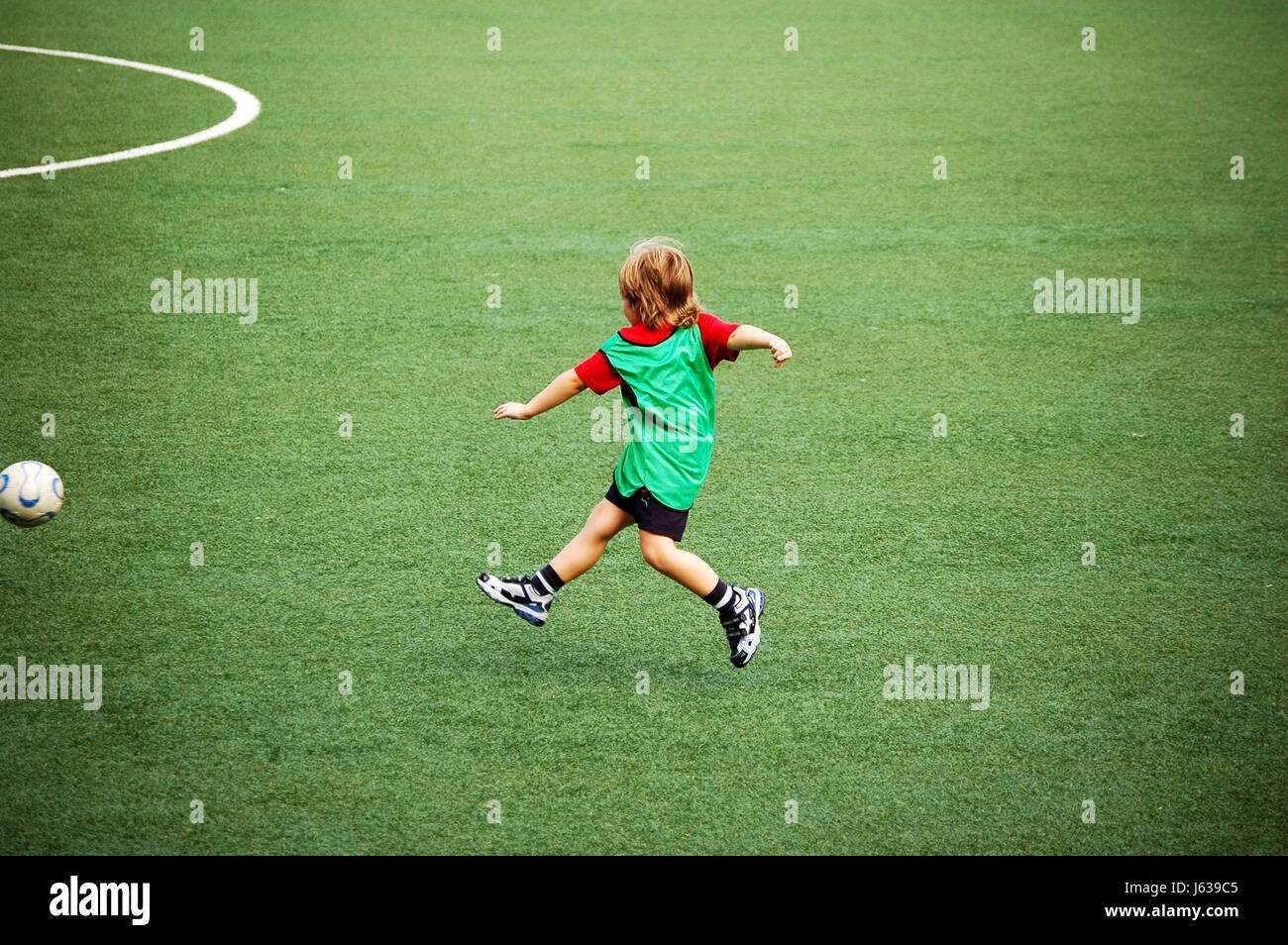 child during football workout Stock Photo - Alamy