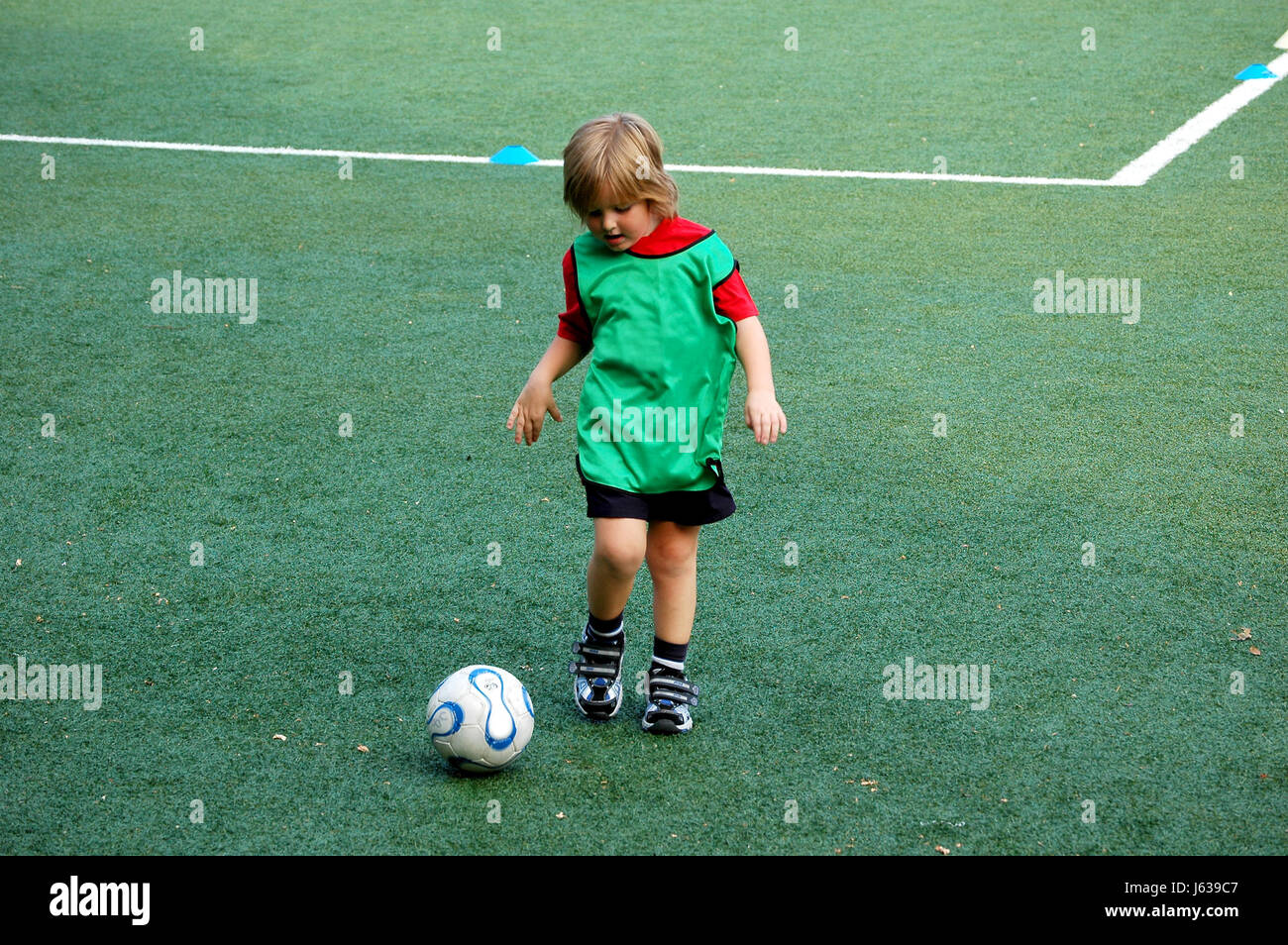 child during football workout Stock Photo - Alamy