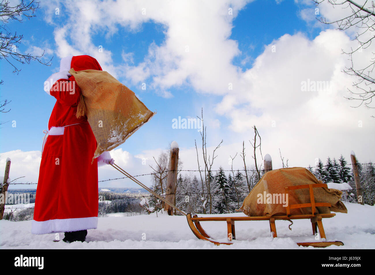 father christmas outside nicholas bag sledge snow scenery countryside ...