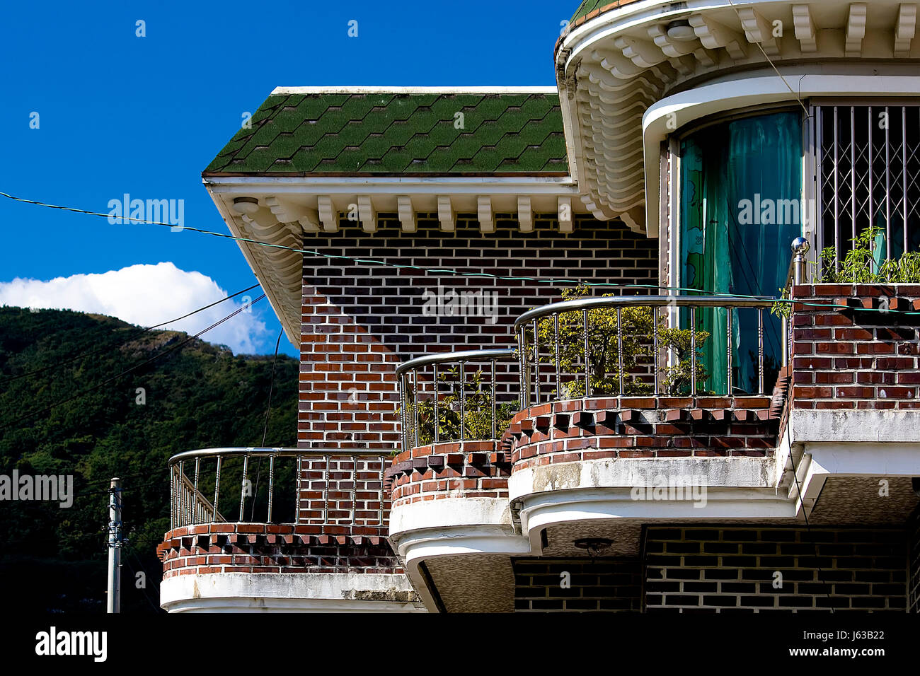 house building window porthole dormer window pane balcony railing ...